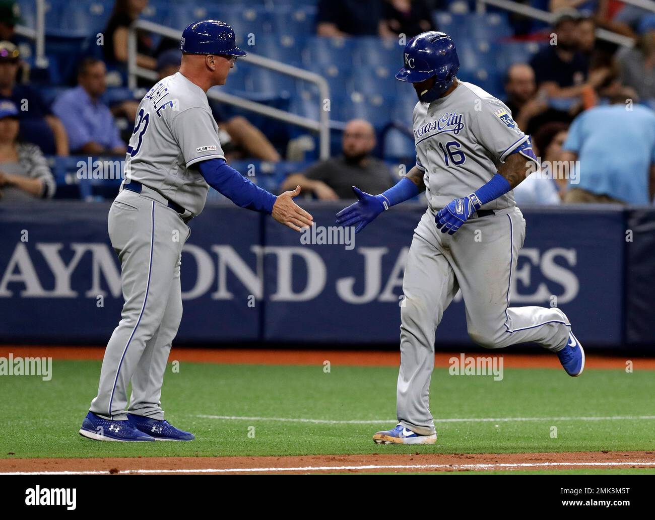 Kansas City Royals' Martin Maldonado (16) celebrates with third base ...