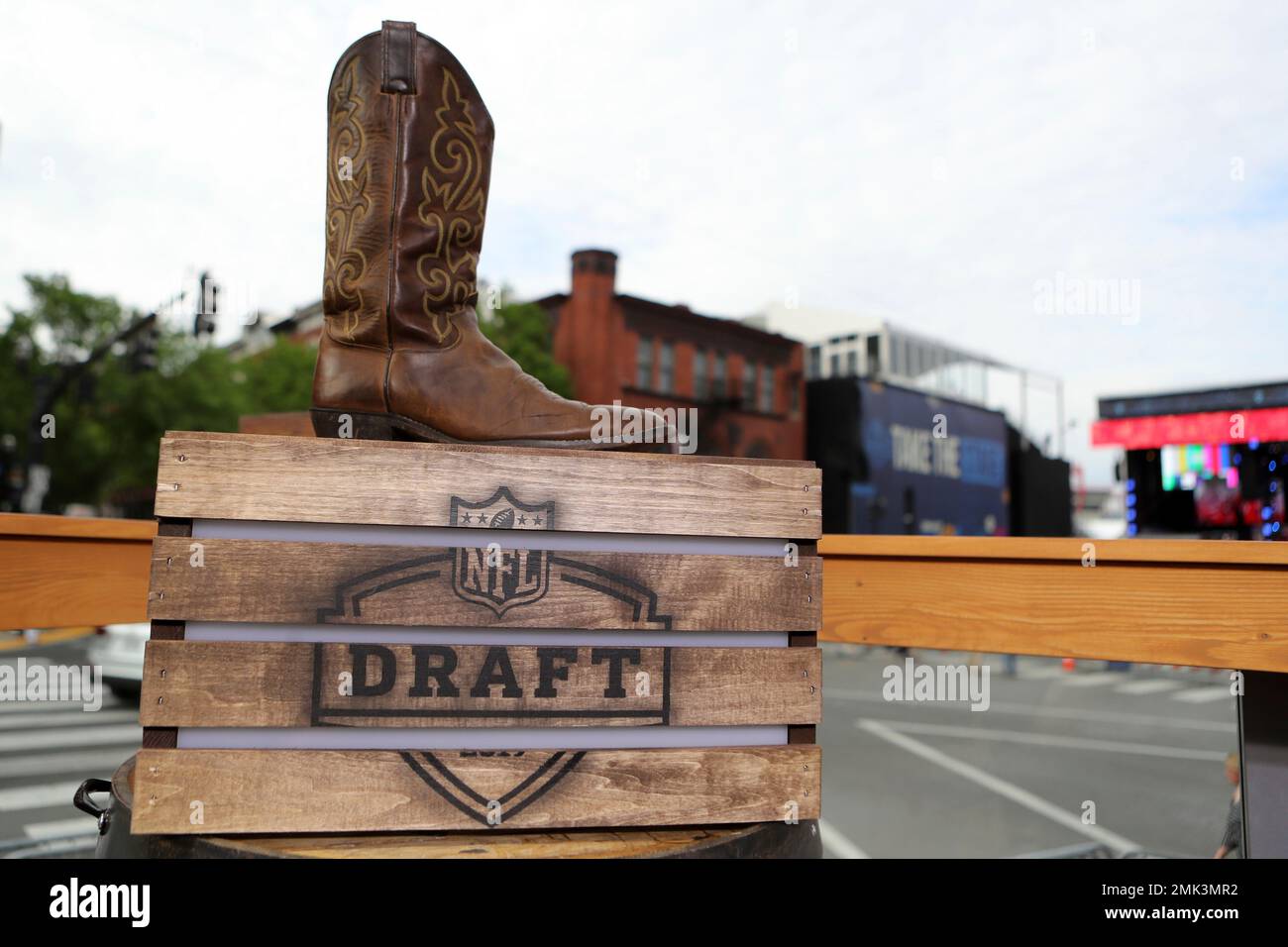 The logo for the 2019 NFL Draft is seen with a cowboy boot in Nashville ...
