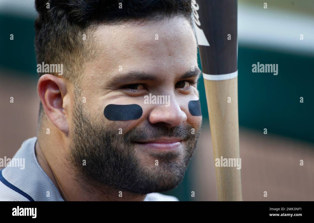Houston Astros' Jose Altuve waits in the dugout before a baseball game ...
