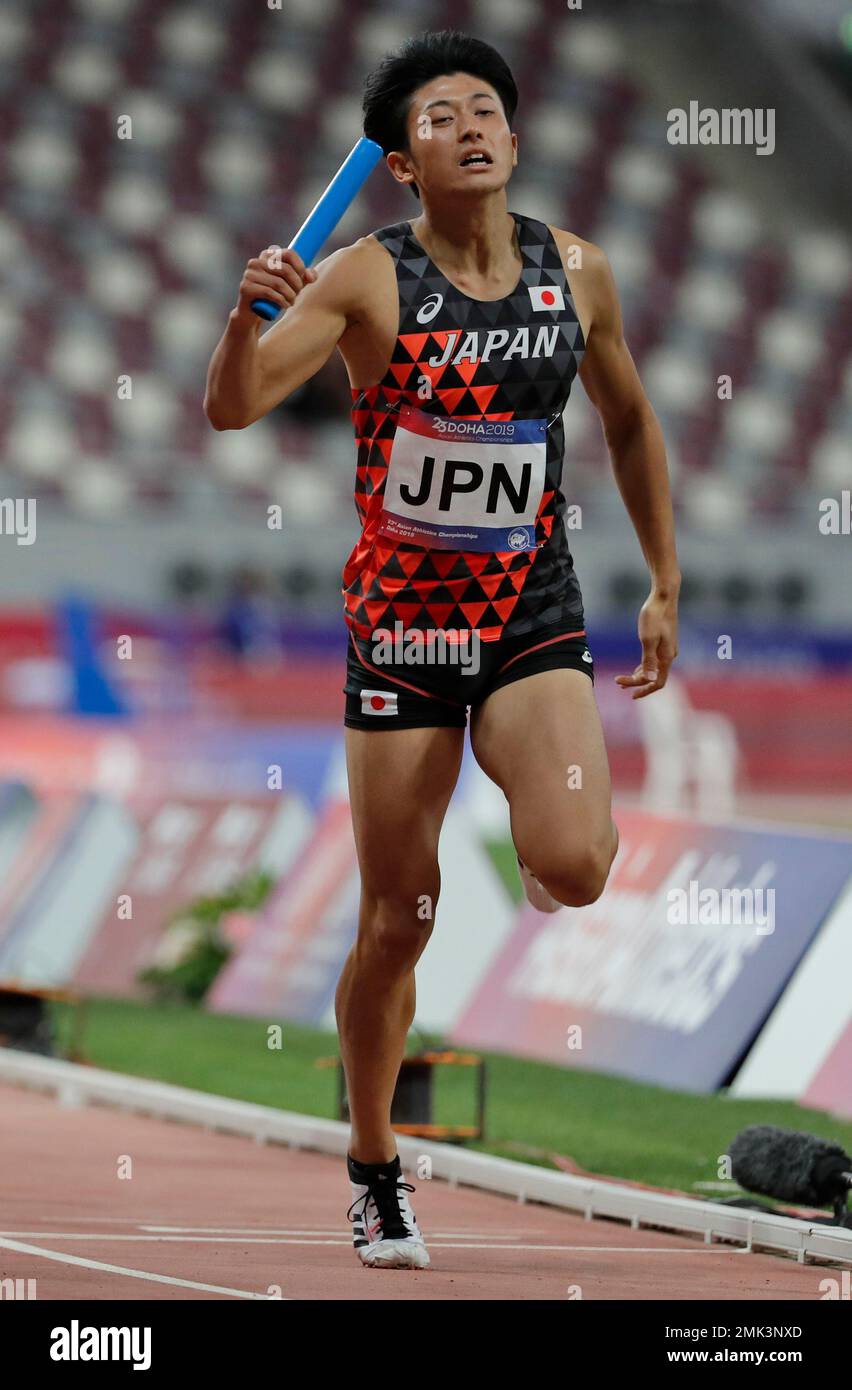 A Japanese athlete competes in the 4x400 mixed relay final at the Asian ...