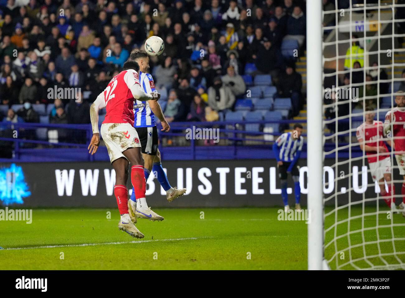 Lee Gregory #9 of Sheffield Wednesday flicks a header goal wards during ...