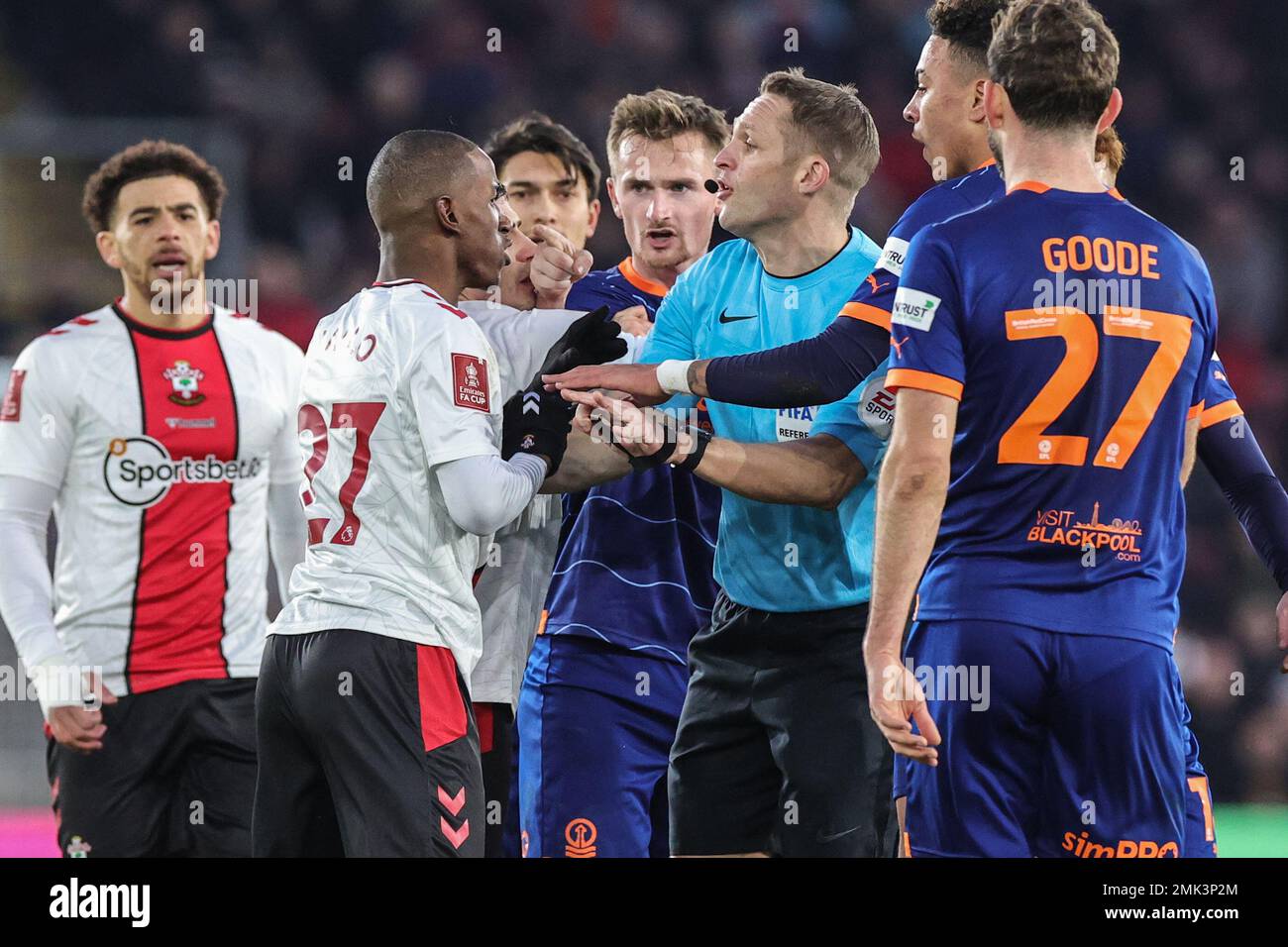 Ibrahima Diallo #27 of Southampton wades into referee Craig Pawson after receiving a yellow card ...