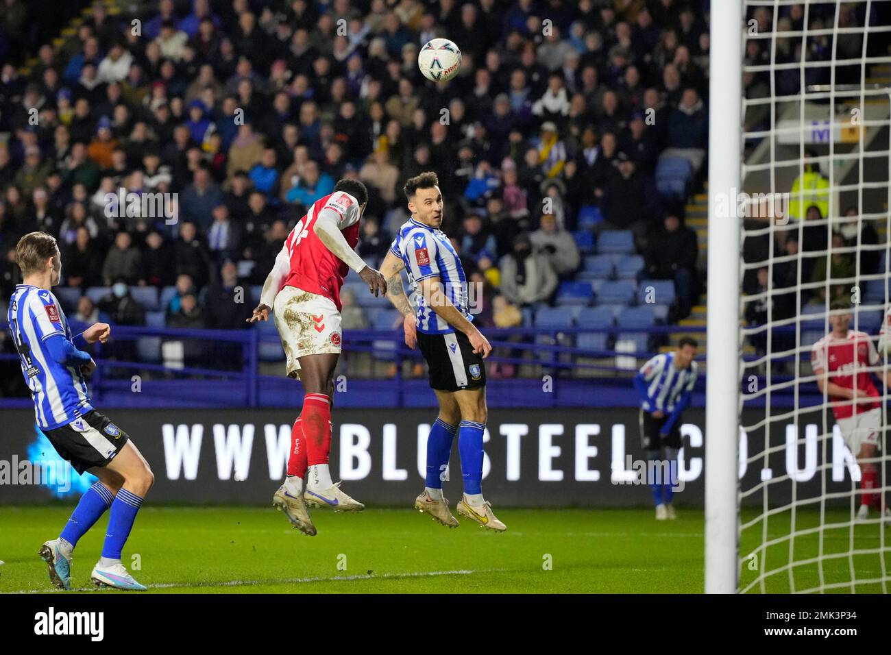 Lee Gregory #9 of Sheffield Wednesday flicks a header goal wards during ...
