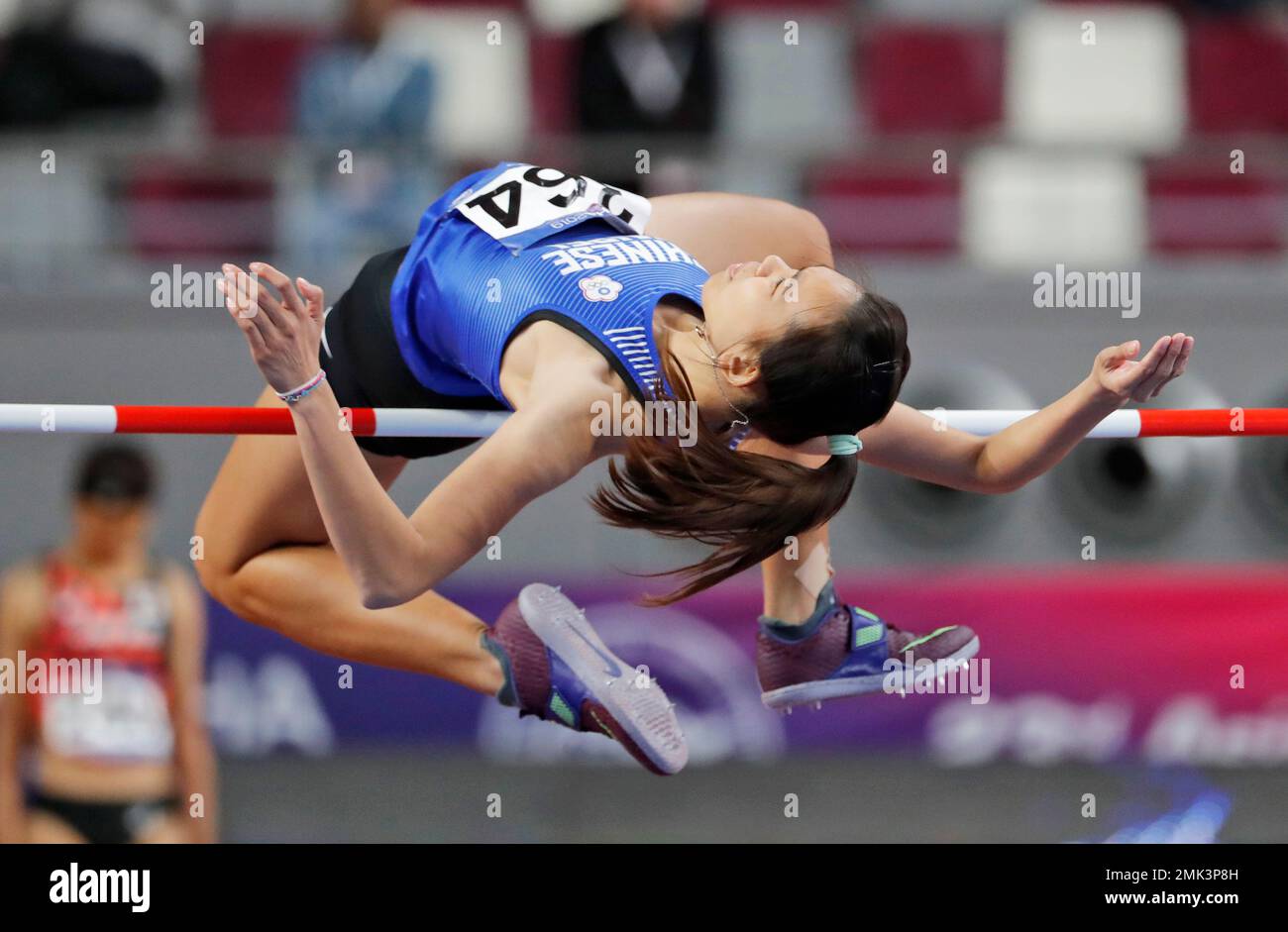 Taiwan's Tsai Ching-jung competes in the women's high jump final at the ...