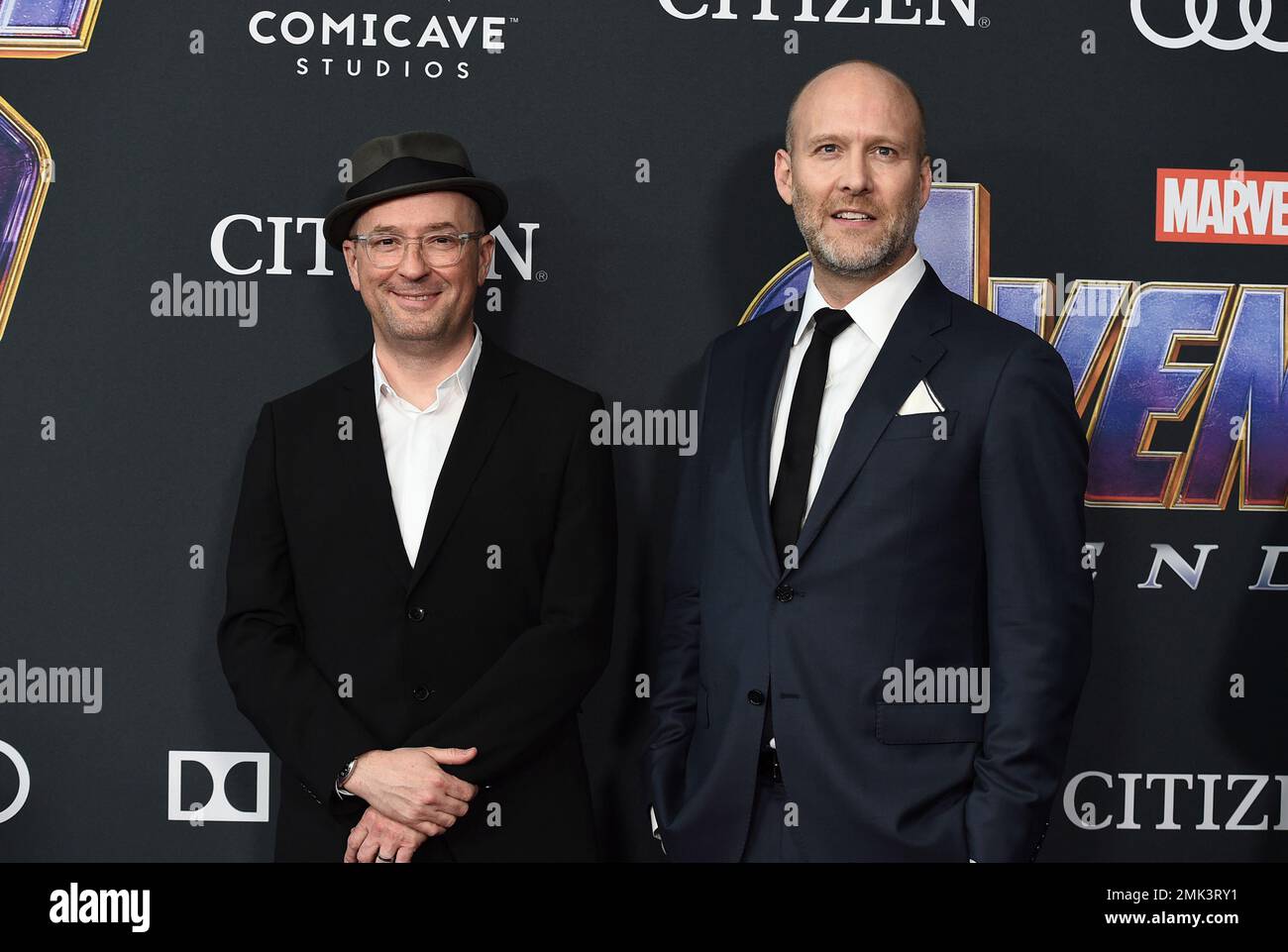 Screenwriters Christopher Markus, left, and Stephen McFeely arrive at ...