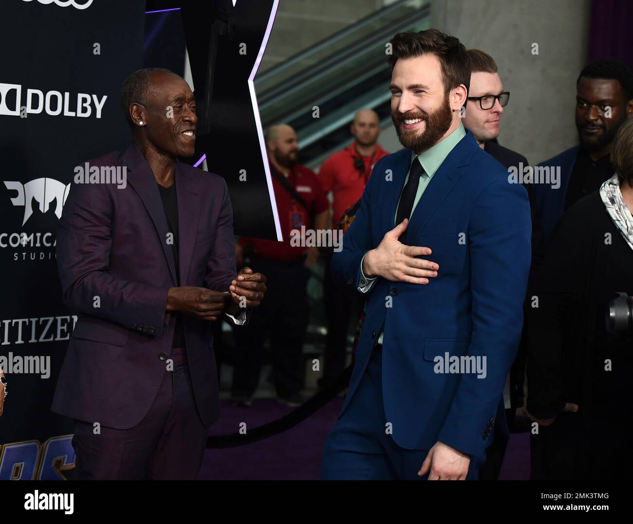 Don Cheadle, left, and Chris Evans arrive at the premiere of "Avengers ...