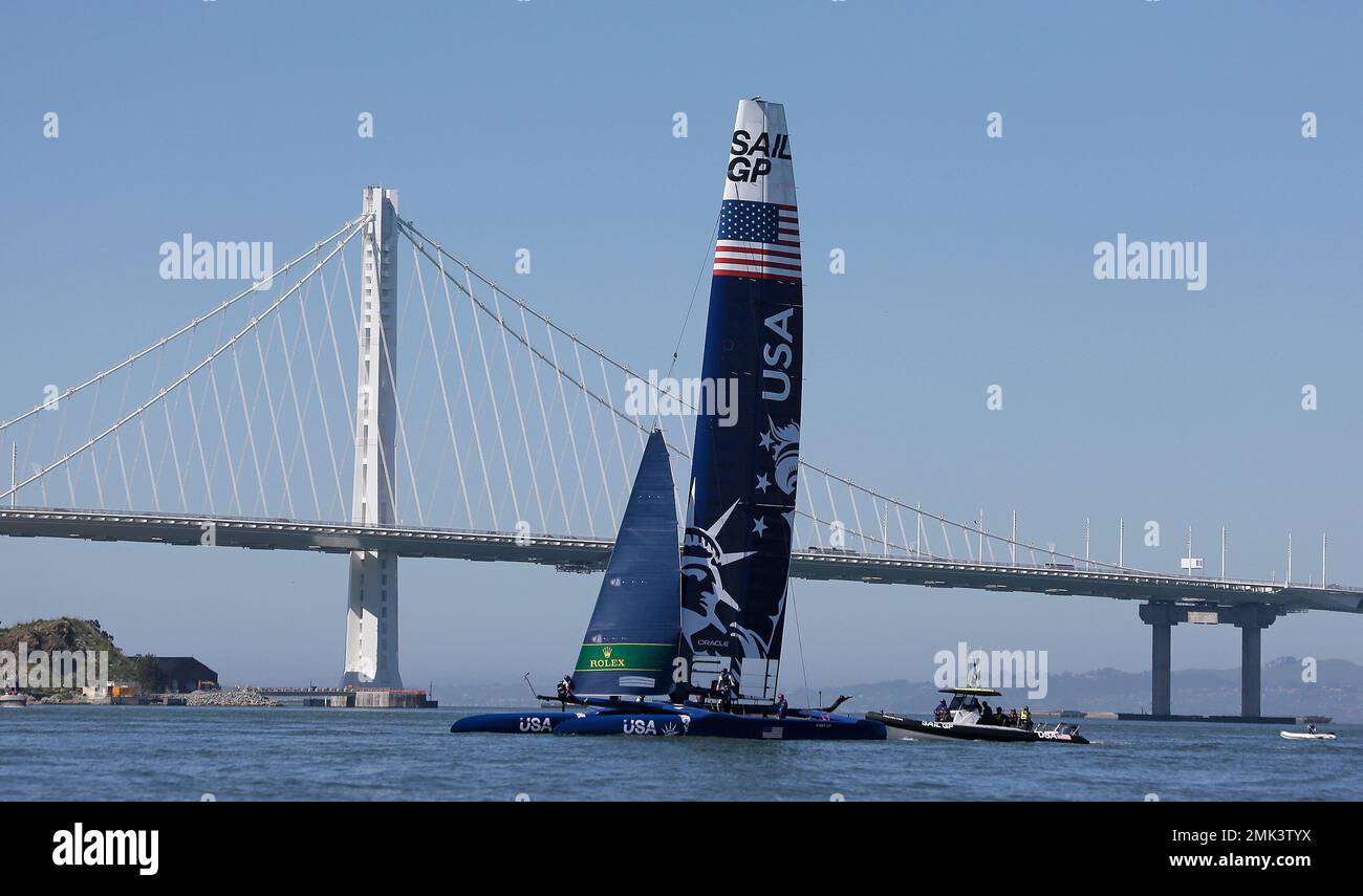 The U.S. team F50 foiling catamaran makes its way past the San ...