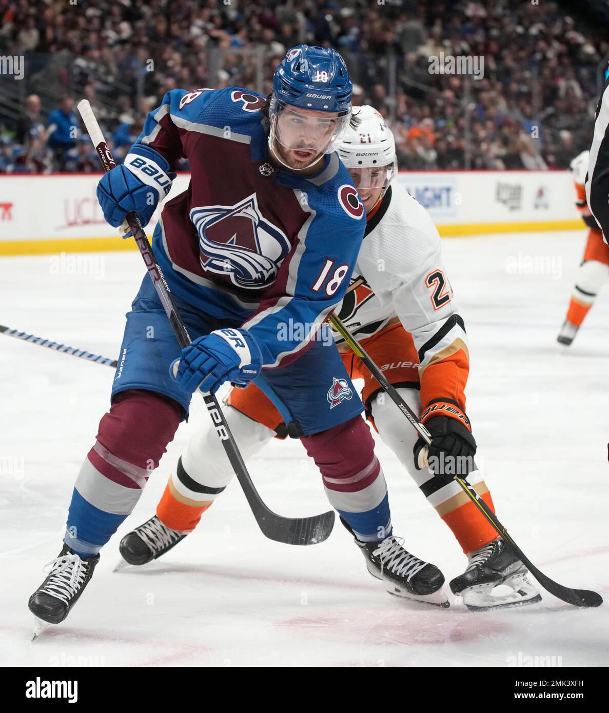 Colorado Avalanche center Alex Newhook (18) and Anaheim Ducks center ...
