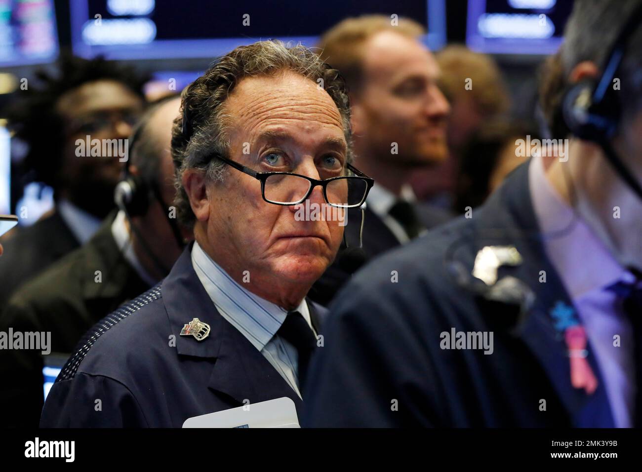 FILE - In this April 12, 2019, file photo trader Steven Kaplan works on ...