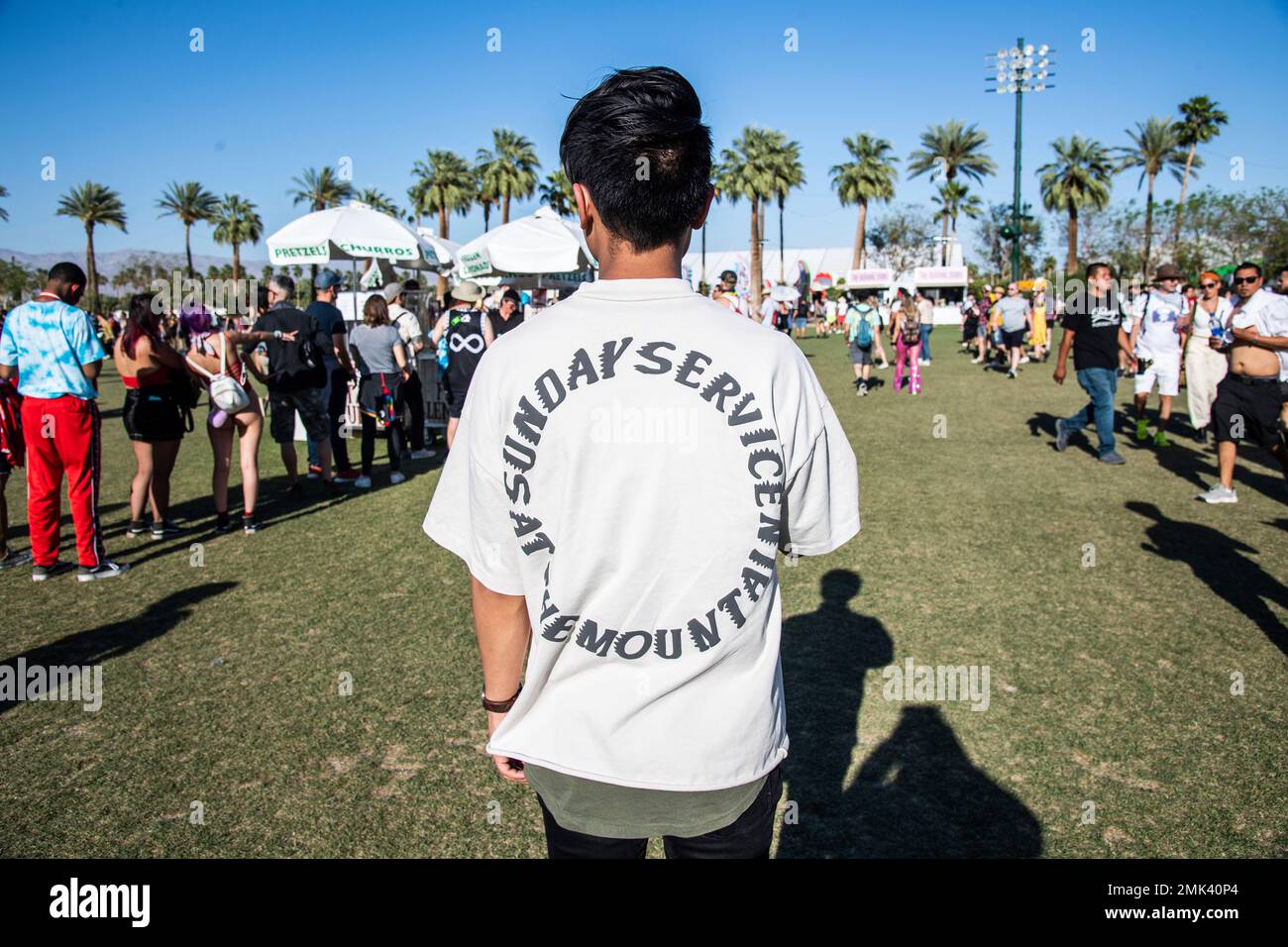 A festival goers wears Kanye West Sunday Service merchandise at the ...