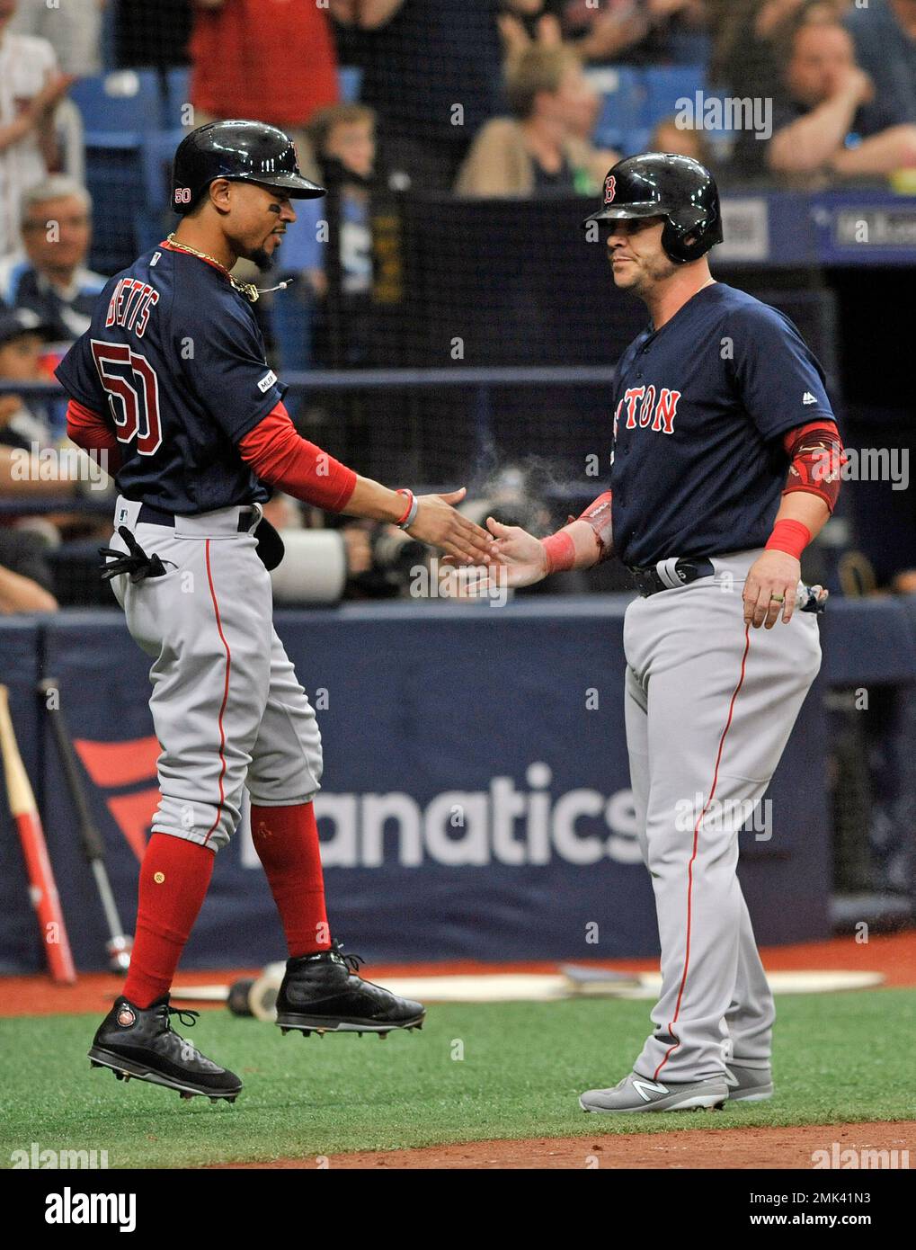 Boston Red Sox's Mookie Betts, left, and Steve Pearce celebrate after ...