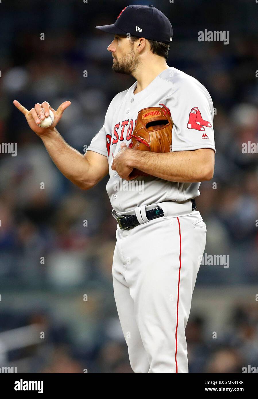 Boston Red Sox starting pitcher Nathan Eovaldi gestures to the second ...