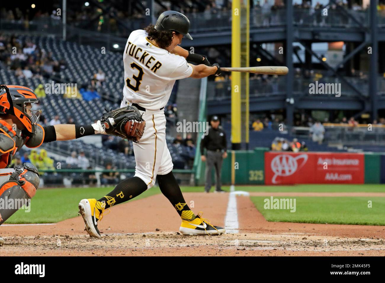 Pittsburgh Pirates' Cole Tucker follows through on a two-run home run ...