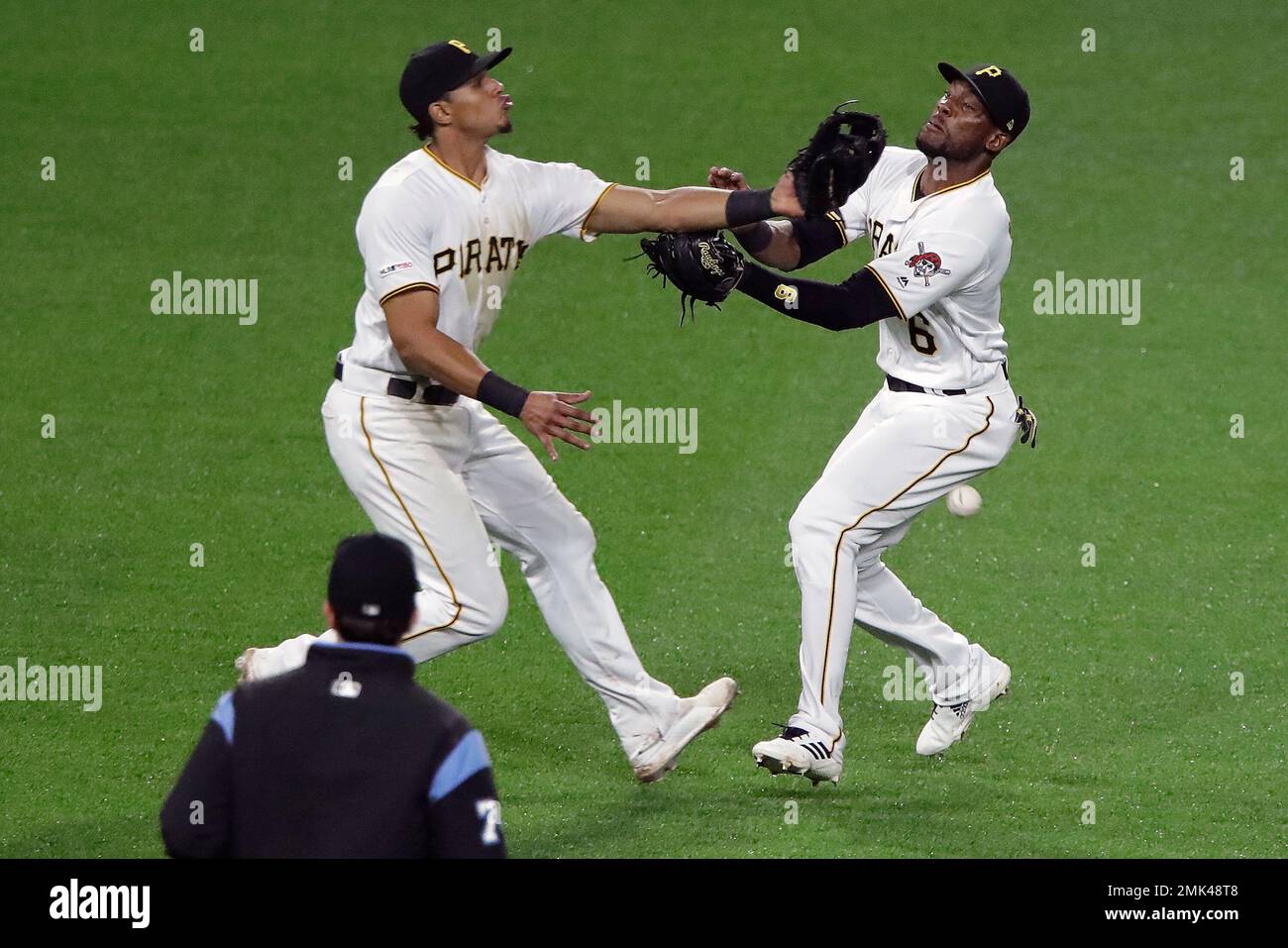 Pittsburgh Pirates center fielder Starling Marte (6) and shortstop Erik ...