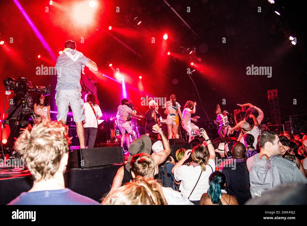Festival goers jump into the crowd as Turnstile performs at the ...