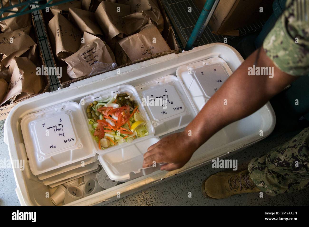 In this photo reviewed by U.S. military officials, a prepared salad is ...