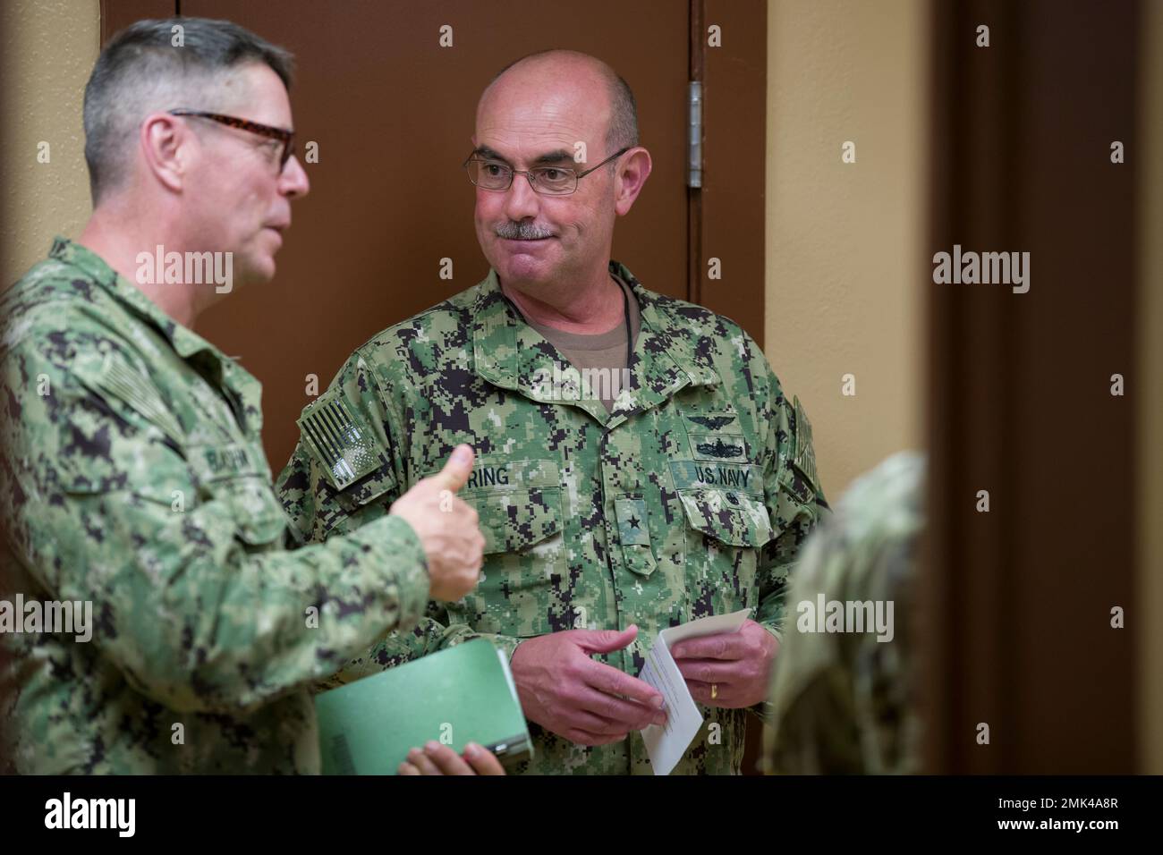 In this photo reviewed by U.S. military officials, U.S. Navy Cmdr. Adam ...