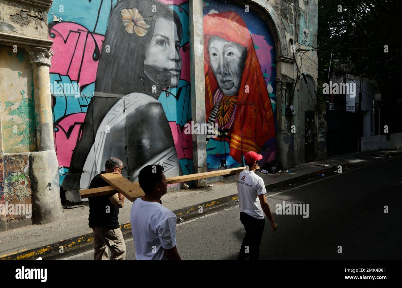 People carry a cross during a Good Friday procession in Panama City ...