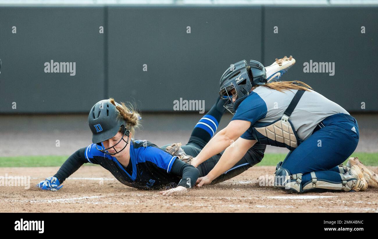 Longwood's Kaylynn Batten, right, tags Duke's Caroline Jacobsen, left ...