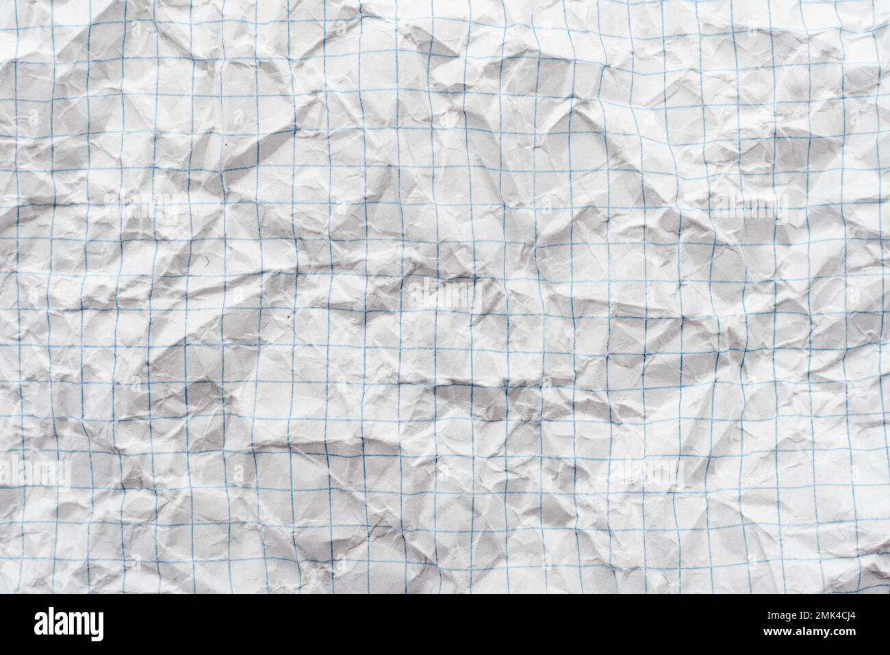 Texture of crumpled white paper in a cage, school notebook. White ...