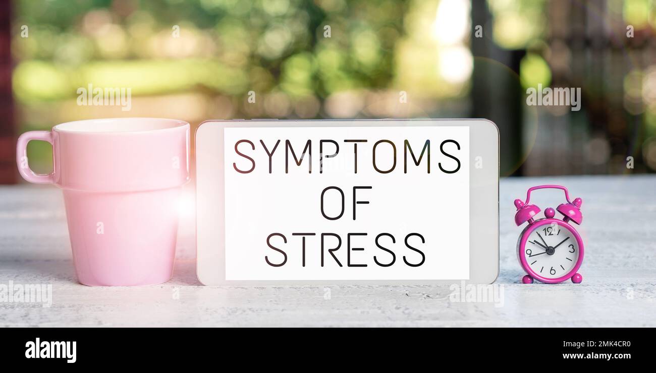 Handwriting text Symptoms Of Stress. Word Written on serving as symptom ...