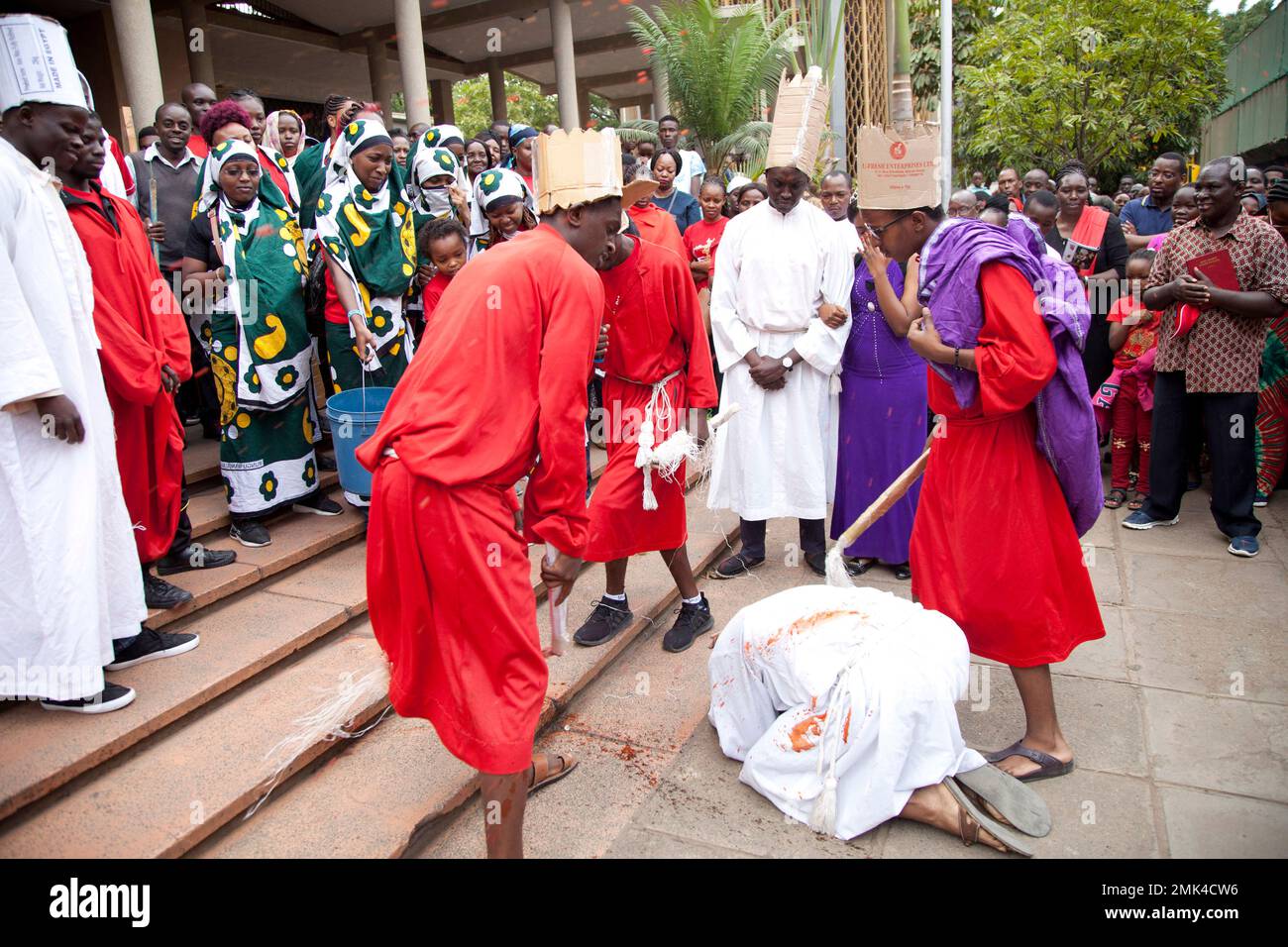 Actors perform the act of Christ crucification in Nairobi, Kenya ...