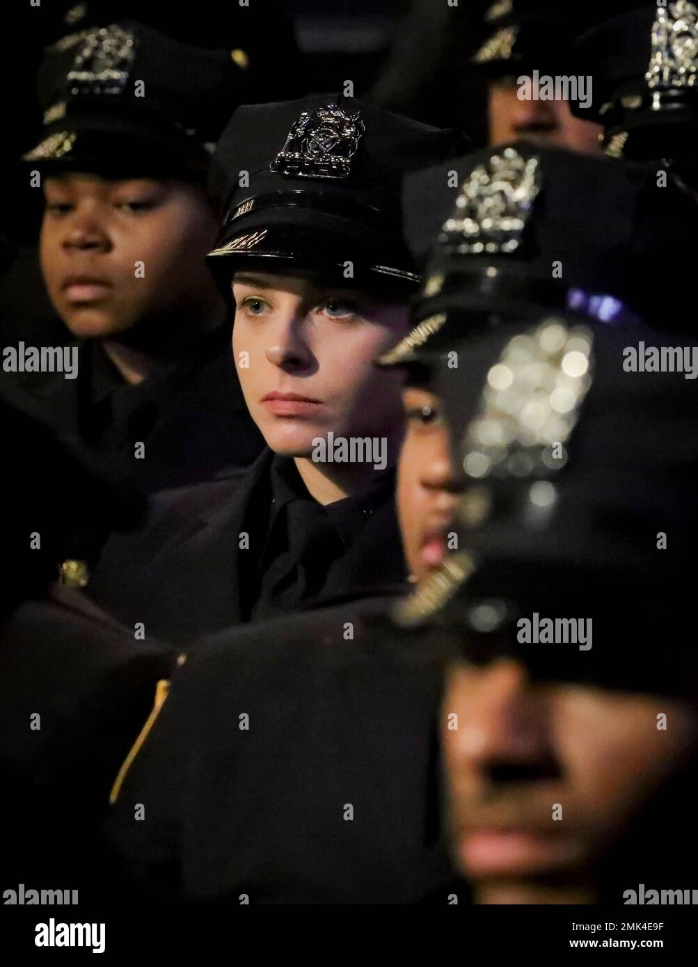 New York City Police Academy graduates listen during their graduation ...
