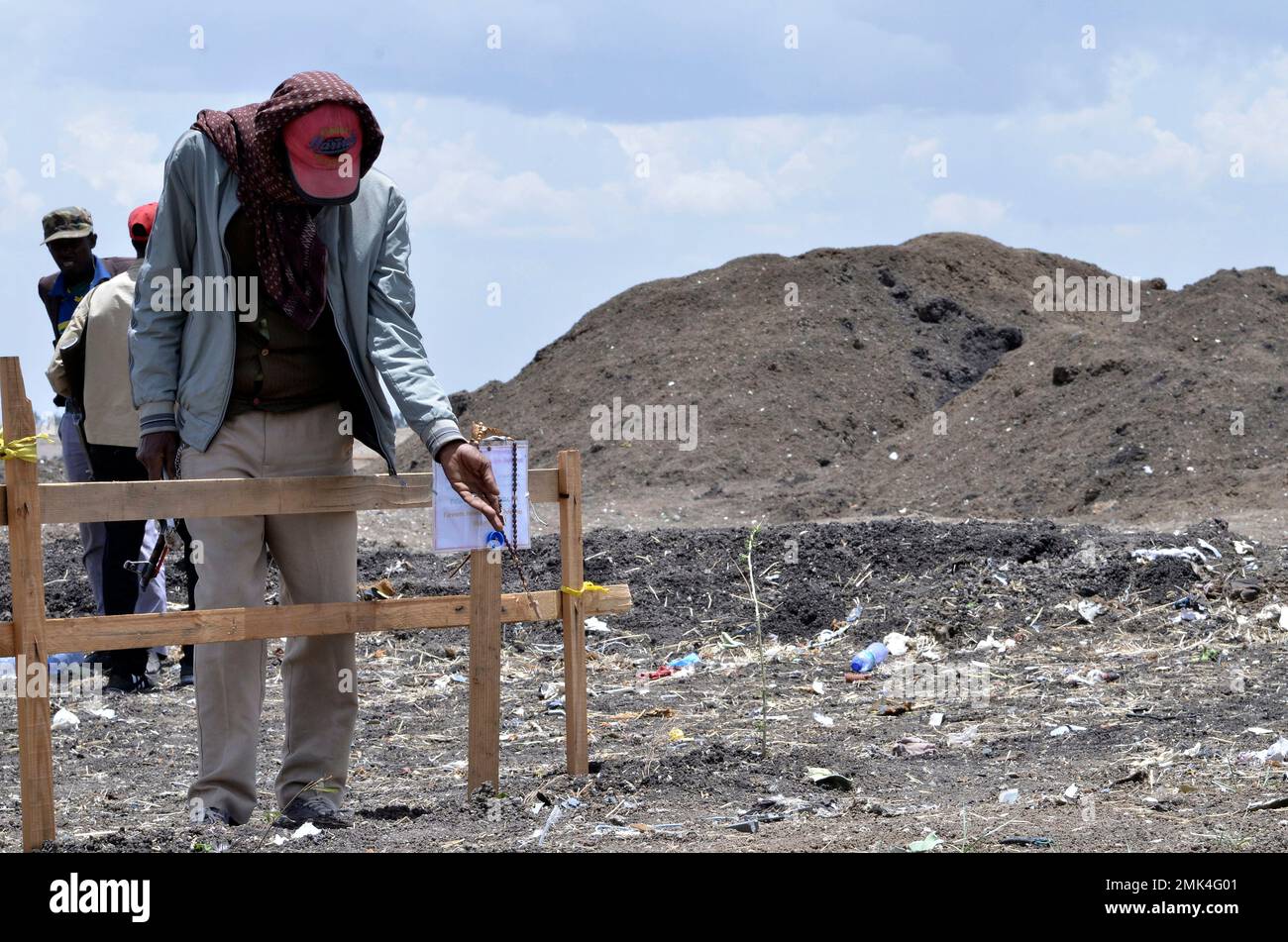 A family member of one of the Ethiopian airlines crash victims holds a ...