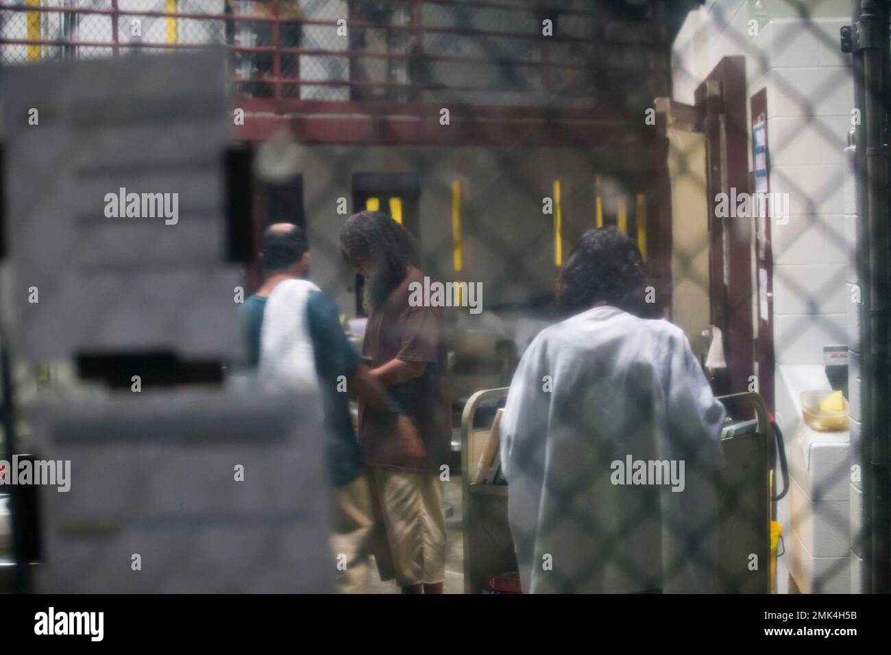 In this photo reviewed by U.S. military officials, detainees, names and ...