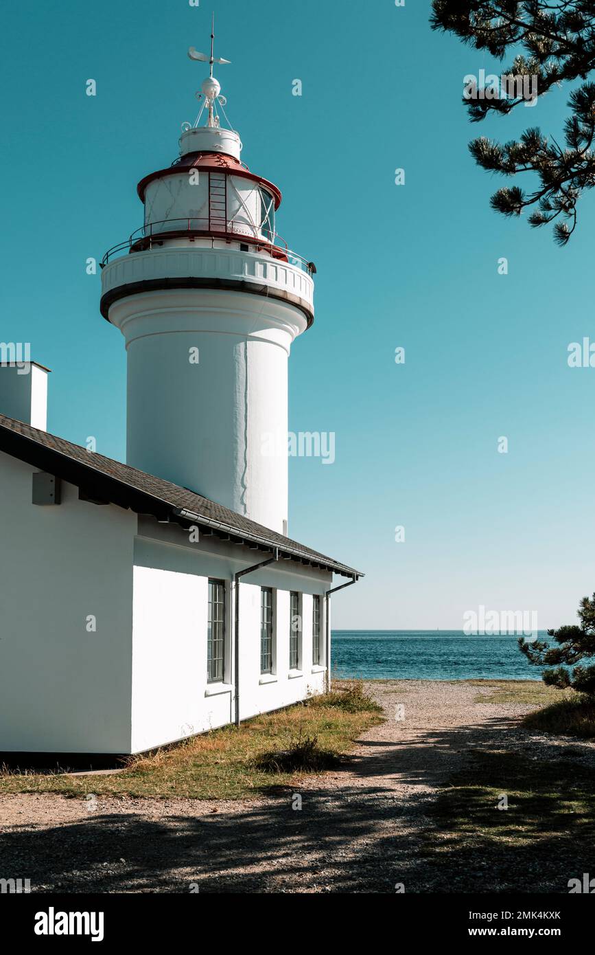 Denmark, Jutland, Djursland: The white round lighthouse Sletterhage on ...