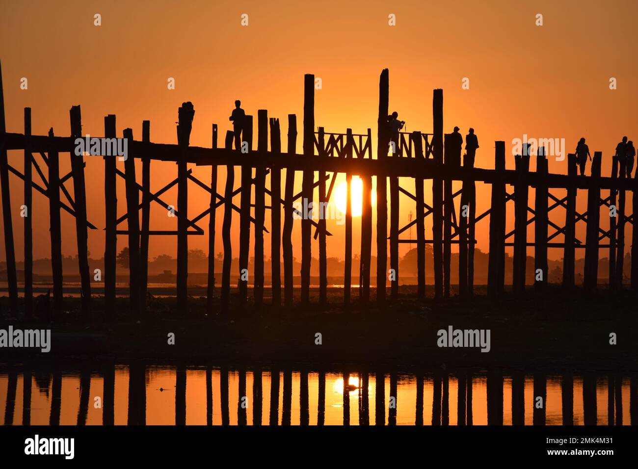Sunset at U-Bein bridge Stock Photo - Alamy