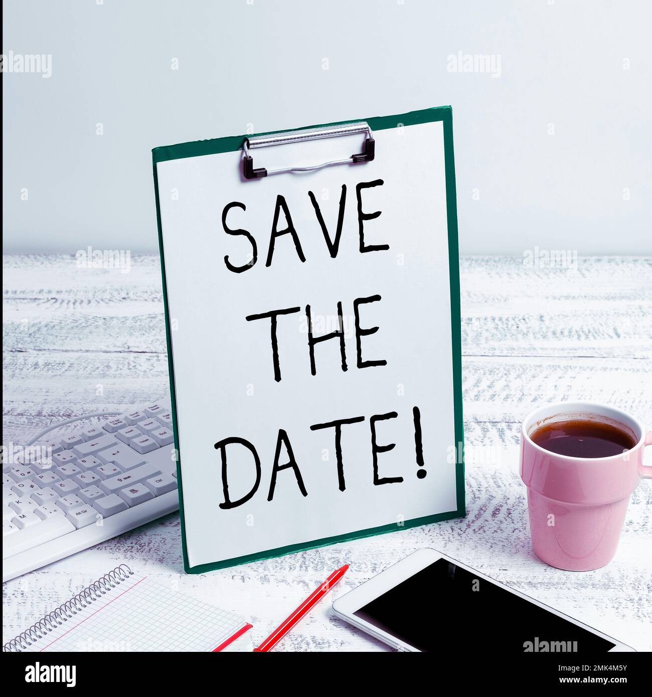 Hand writing sign Save The Date. Business idea Remembering the schedule Mark the calendar ...