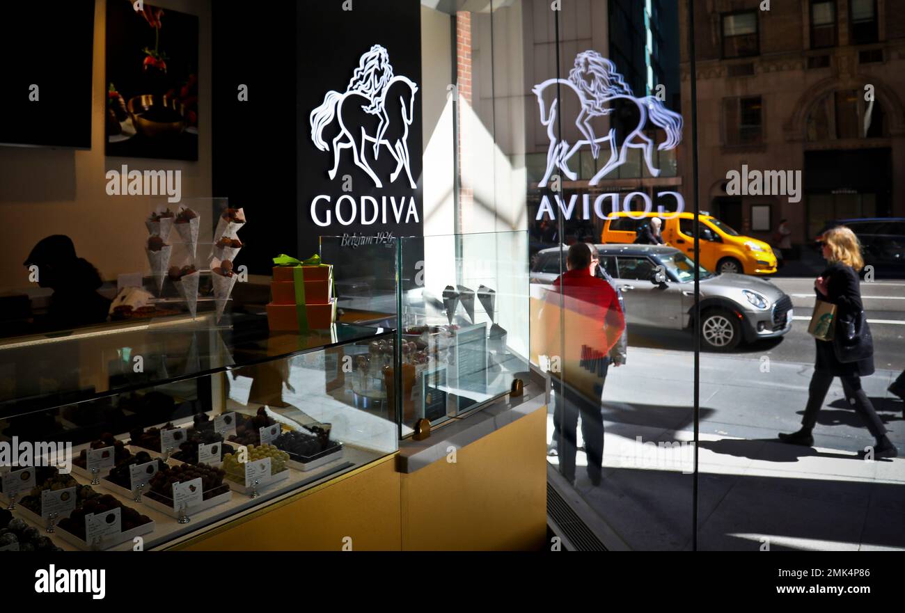 A display of chocolate treats is displayed at Godiva's new cafe in New ...