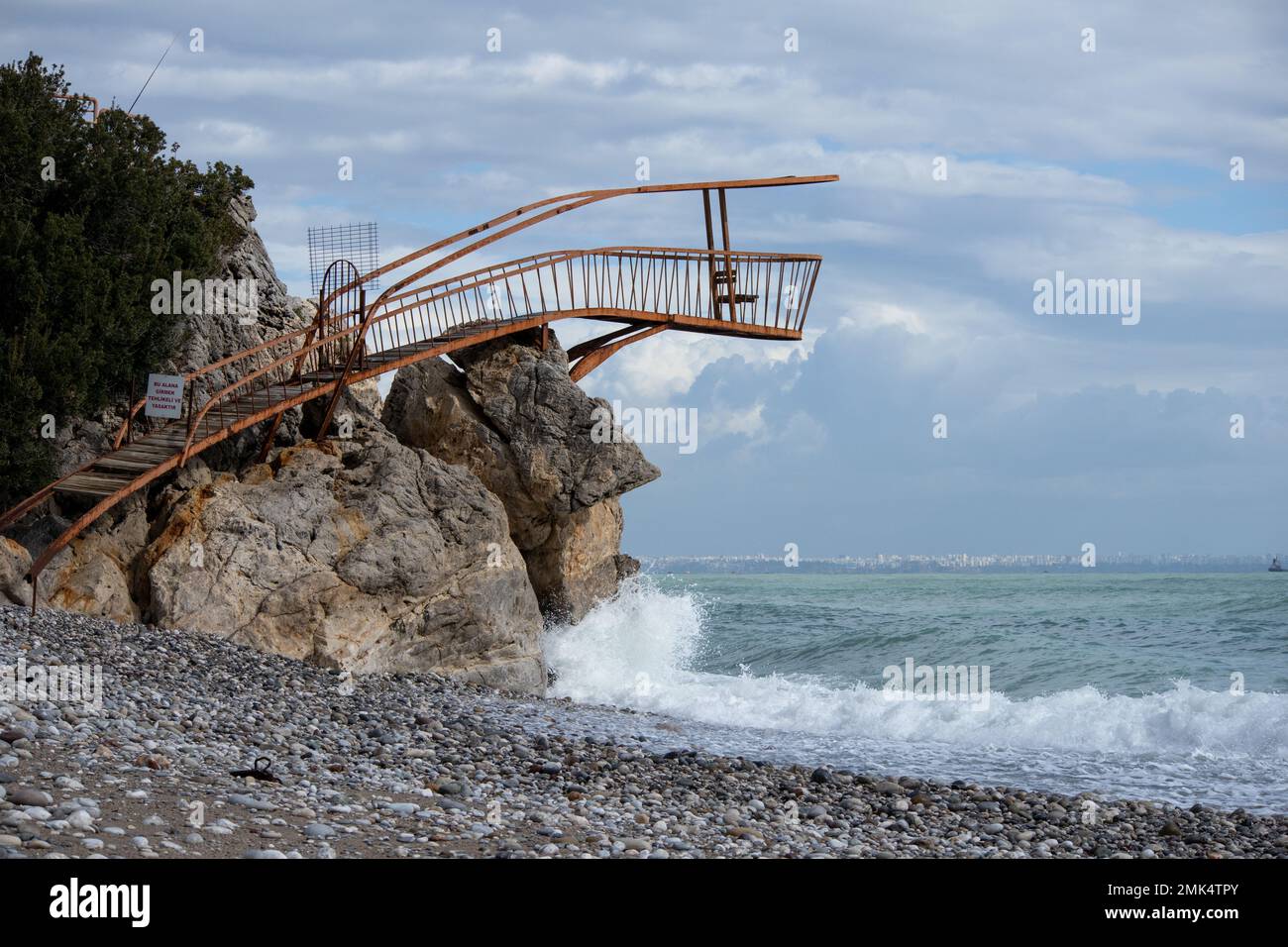 Metal steps and an observation deck on the rock Stock Photo - Alamy