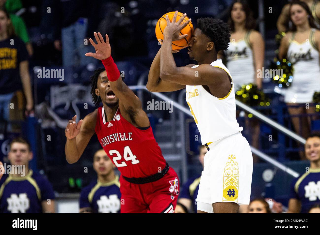 Notre Dame's Trey Wertz (3) shoots as Louisville's Jae'Lyn Withers (24 ...