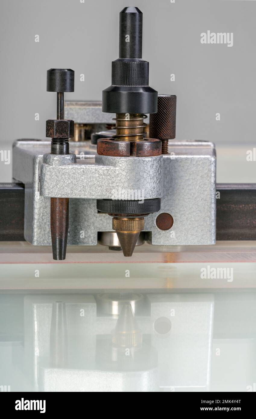 detail shot of a layout table showing the drawing unit with fixation ...