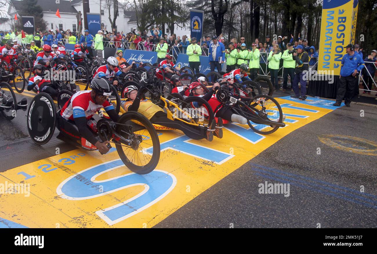 The handcycle division breaks from the start of the123rd Boston ...