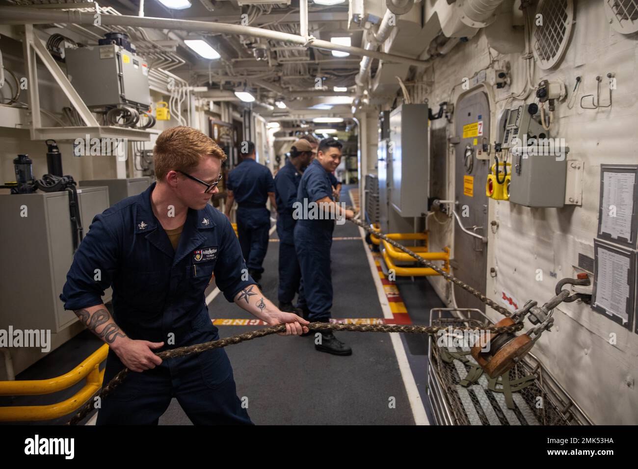 PHILIPPINE SEA (Sept. 5, 2022) – Sailors handle line aboard guided ...