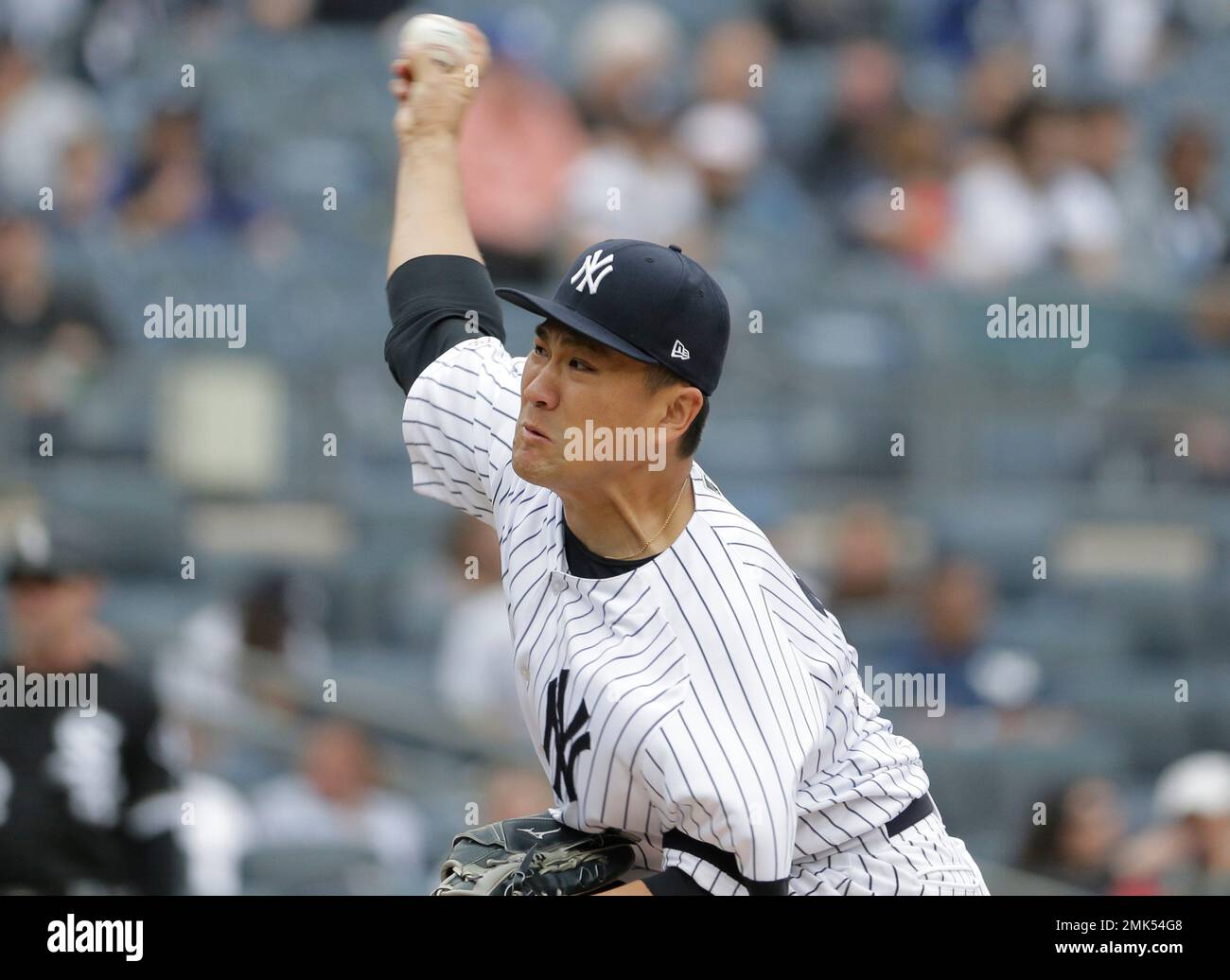 New York Yankees starting pitcher Masahiro Tanaka throws during the ...