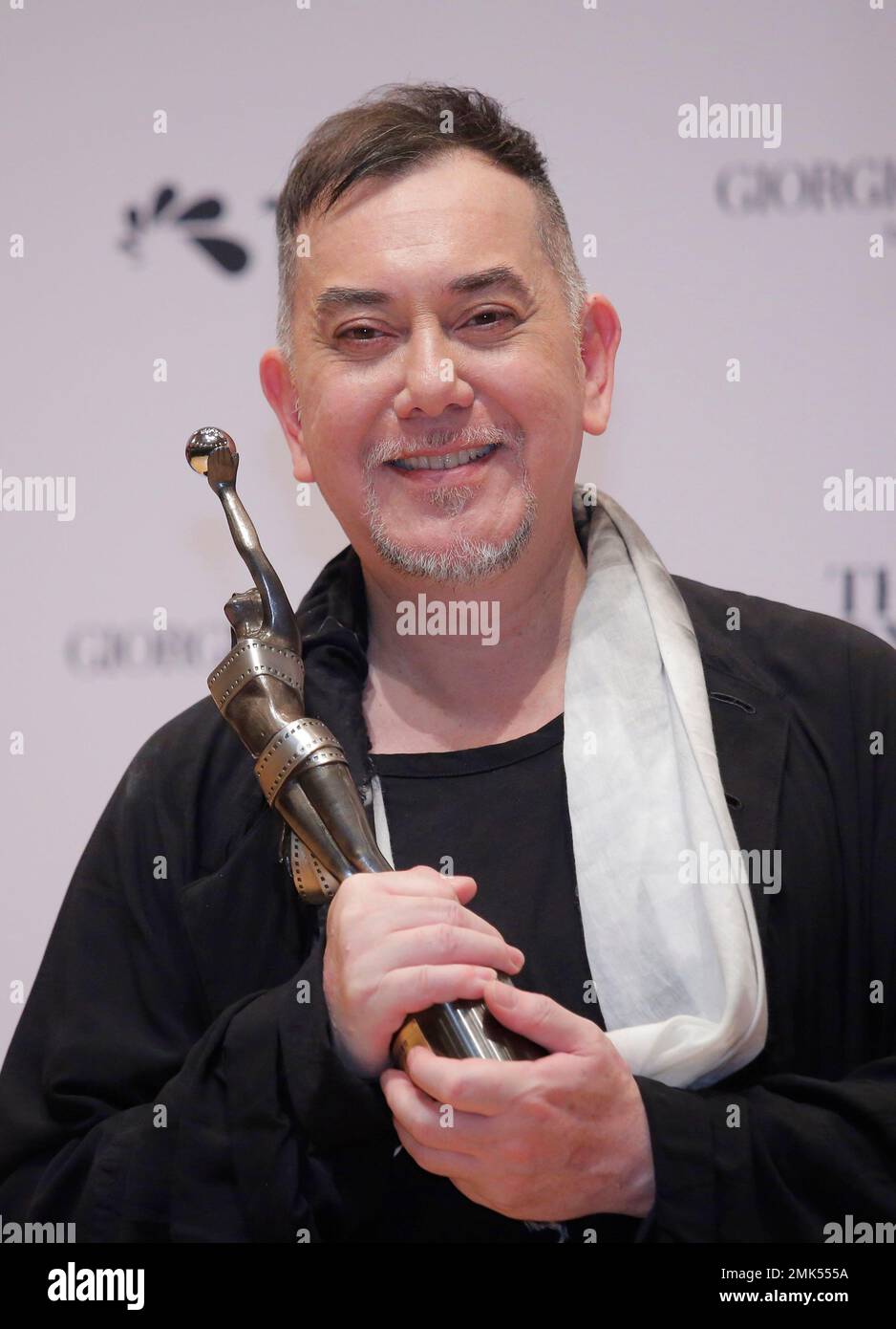 Hong Kong actor Anthony Wong poses after winning the Best Actor of his ...