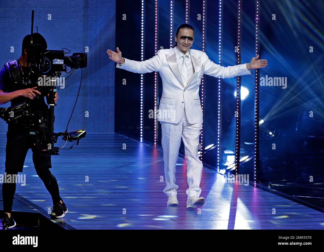 Hong Kong actor Patrick Tse reacts after winning the Lifetime ...