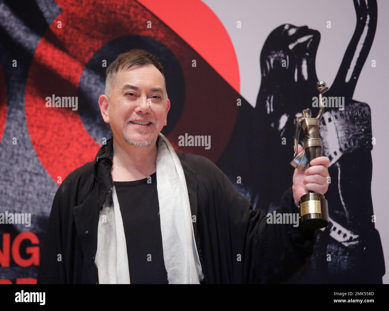 Hong Kong actor Anthony Wong poses after winning the Best Actor of his ...