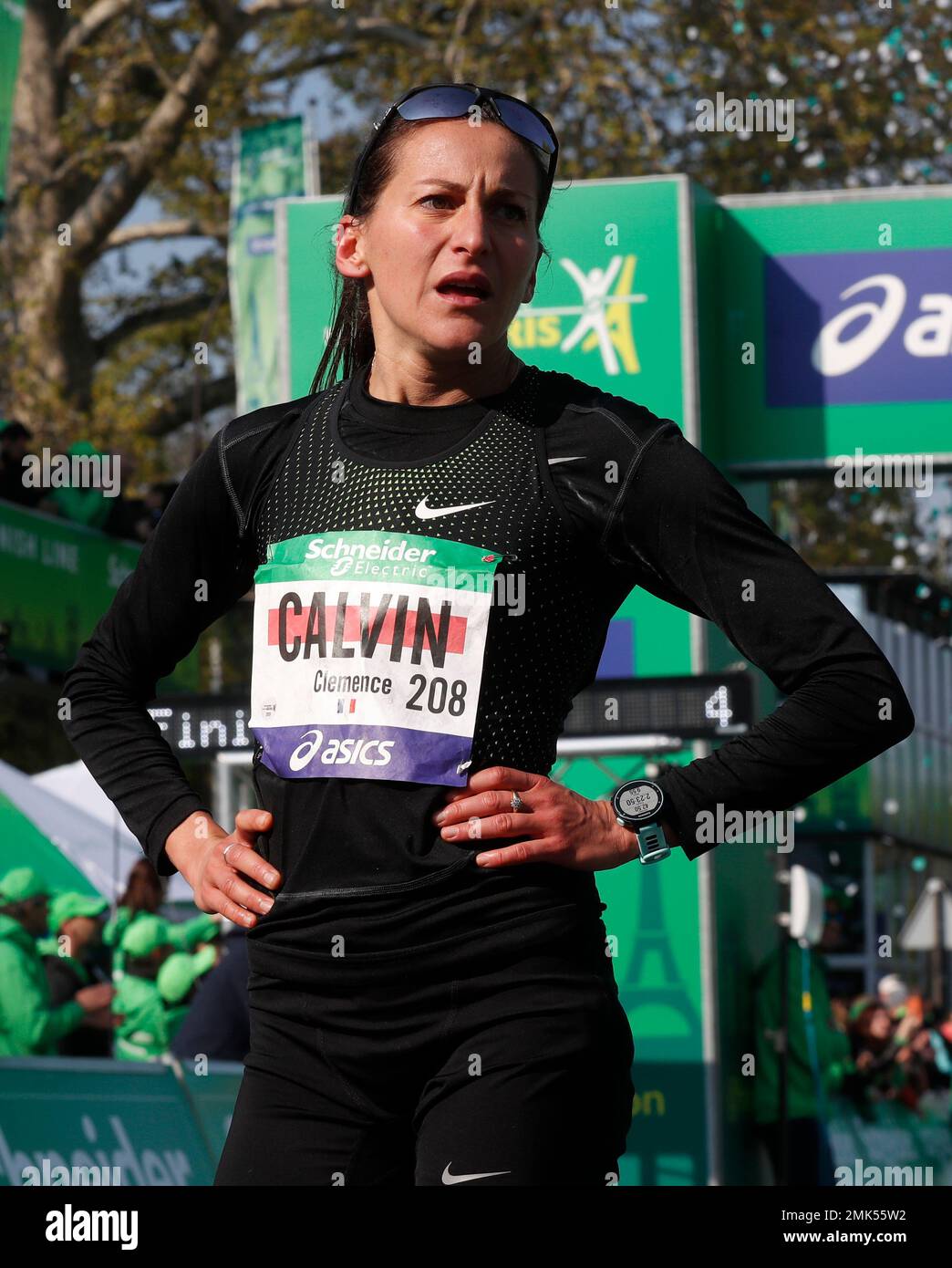 Clemence Calvin of France reacts after cossing the finishing line in ...