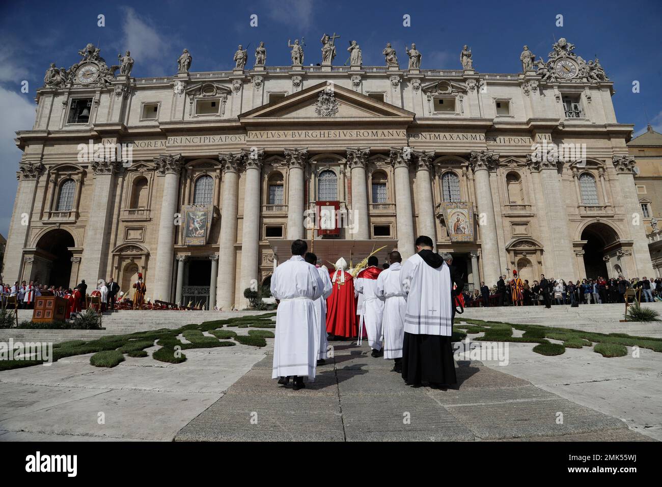 Pope Francis, center, walks in procession as he celebrates a Palm ...