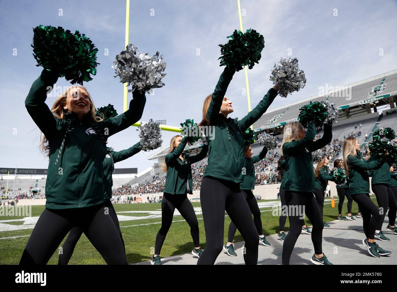 Michigan State dance team members perform during an NCAA college ...