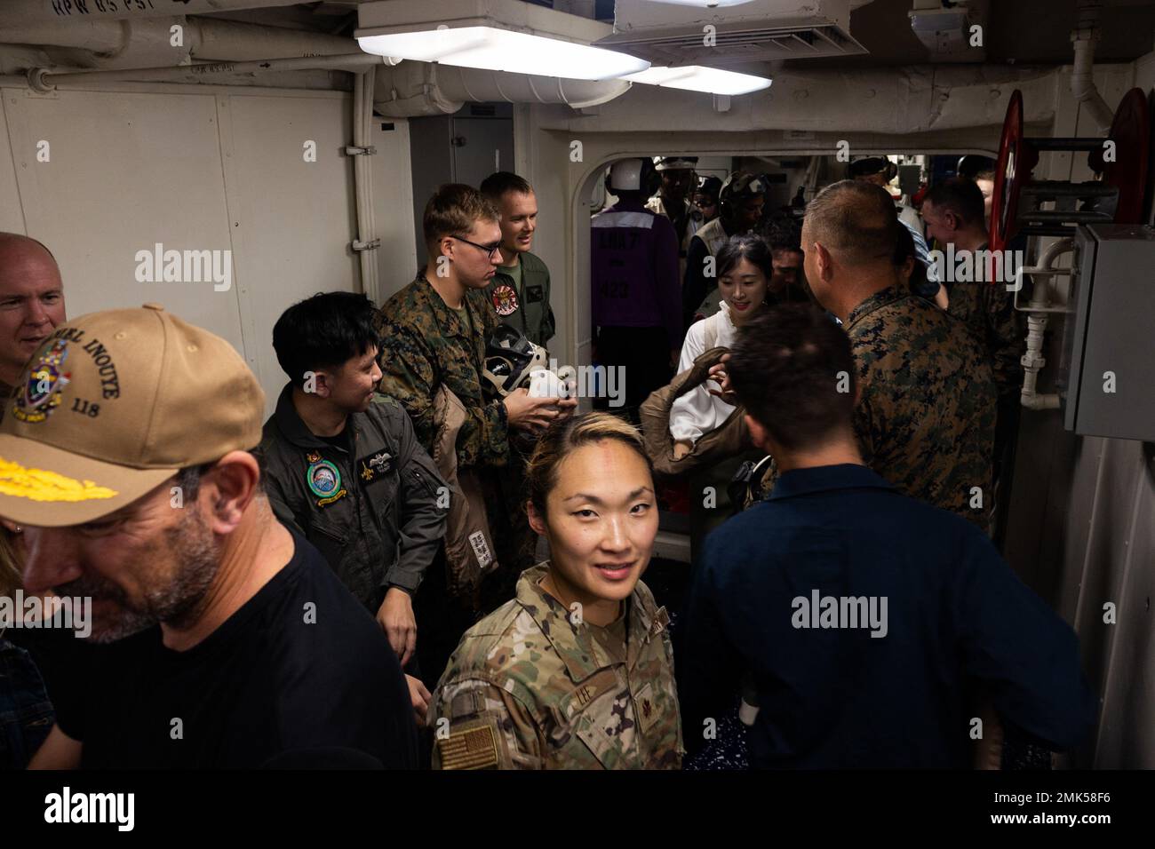 Distinguished visitors and members of PHIBRON 11 are welcomed aboard ...