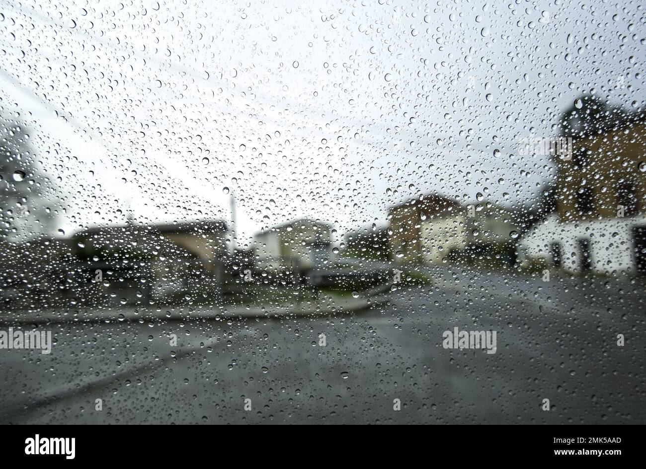 Raindrops on car glass, winter and storm, danger Stock Photo - Alamy