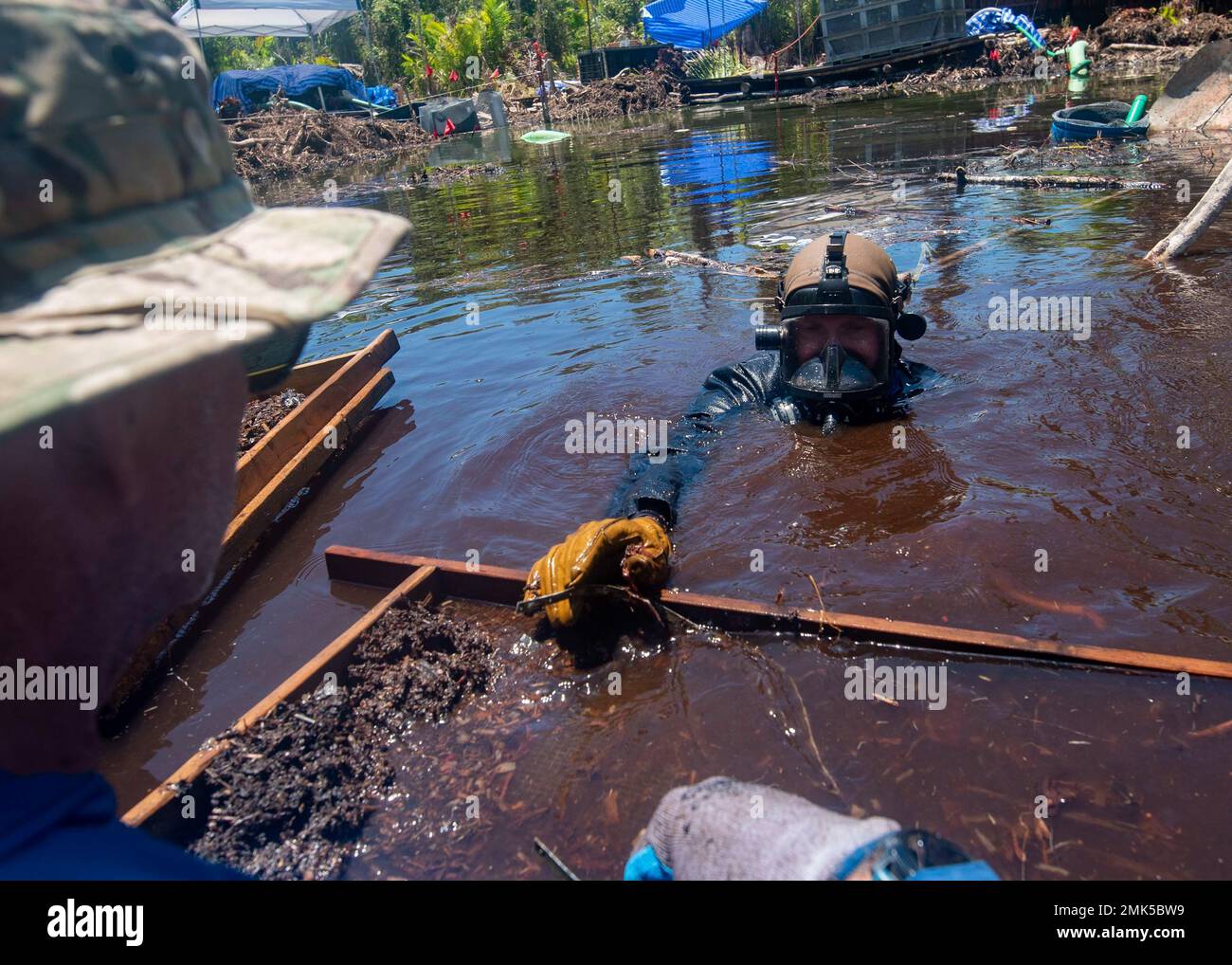 U.S. Coast Guard DV2 David Blincoe, a Coast Guard diver assigned to the ...