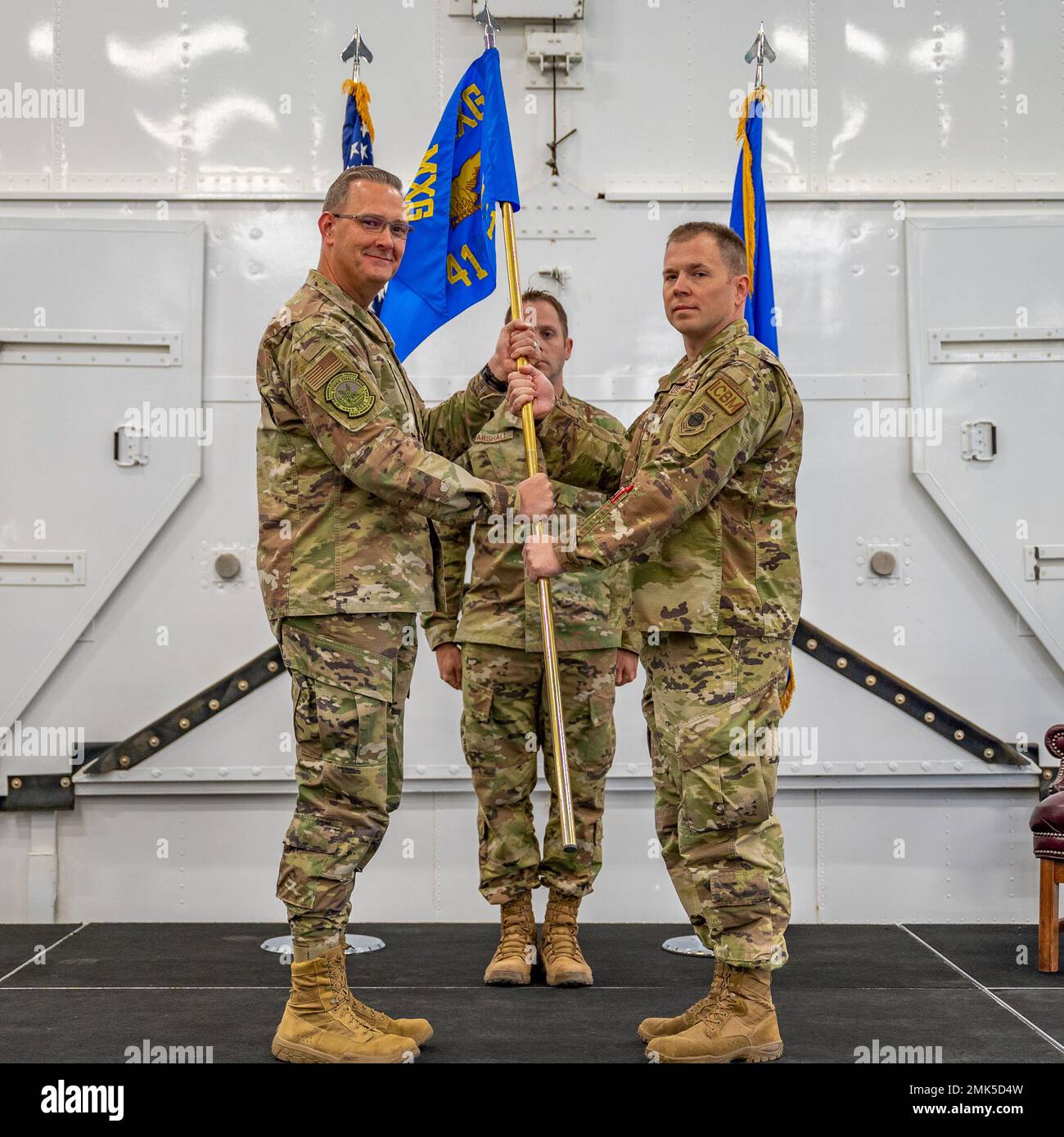 Maj. Todd Yehle, right, accepts command of the 741st Maintenance ...