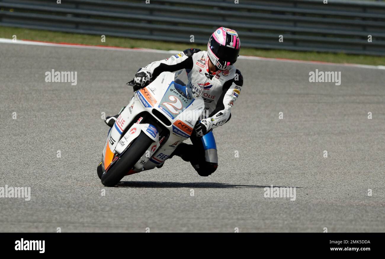 Moto2 riders Jesko Raffin (2), of Switzerland, steers through a turn ...